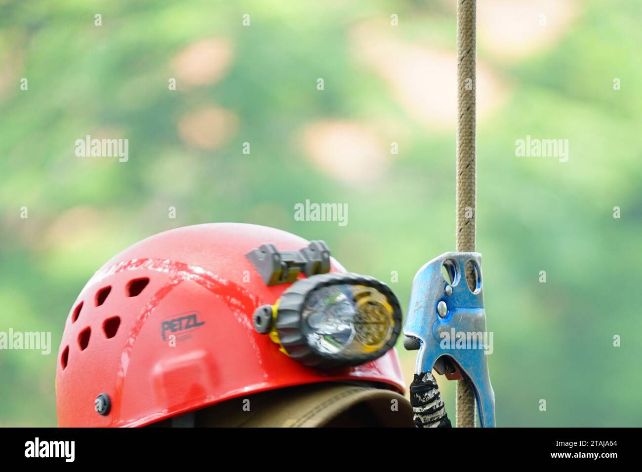 Petzl safety helmets for climbers and caving Stock Photo - Alamy
