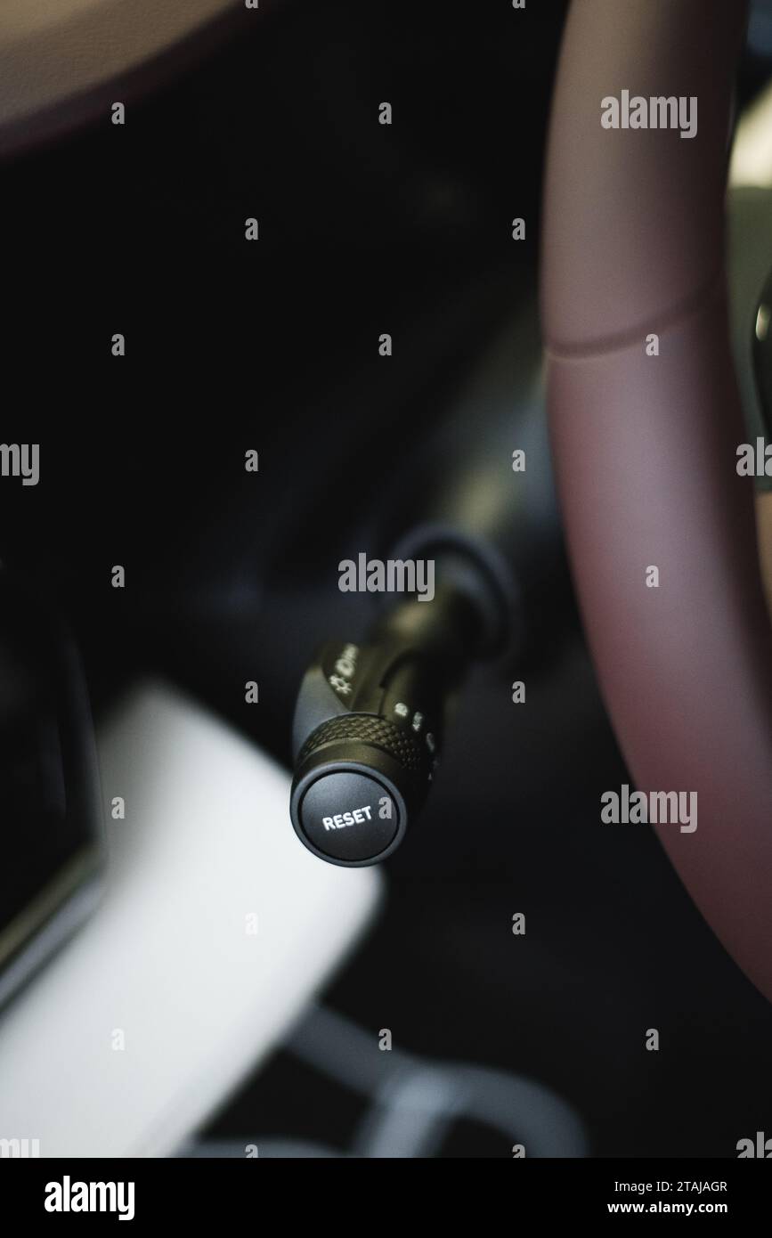 control buttons on the steering wheel of a car. High quality photo ...