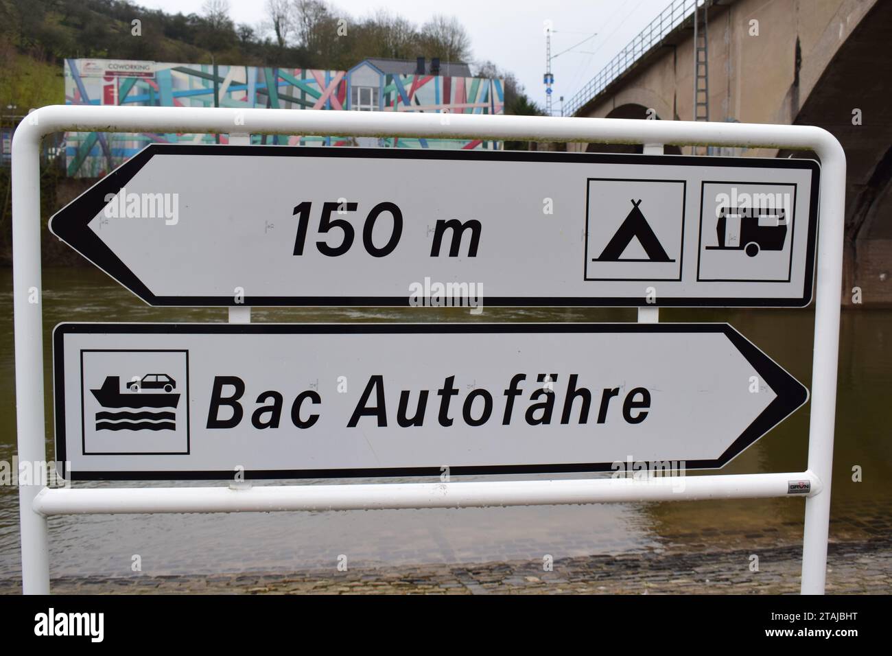 traffic signs to ferry and camping Stock Photo - Alamy