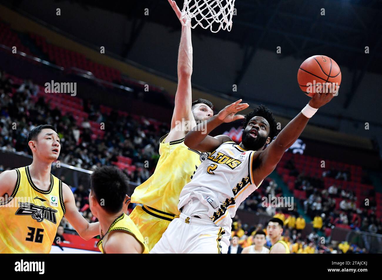 Changchun, China's Jilin Province. 1st Dec, 2023. Derrick Walton (R) of ...