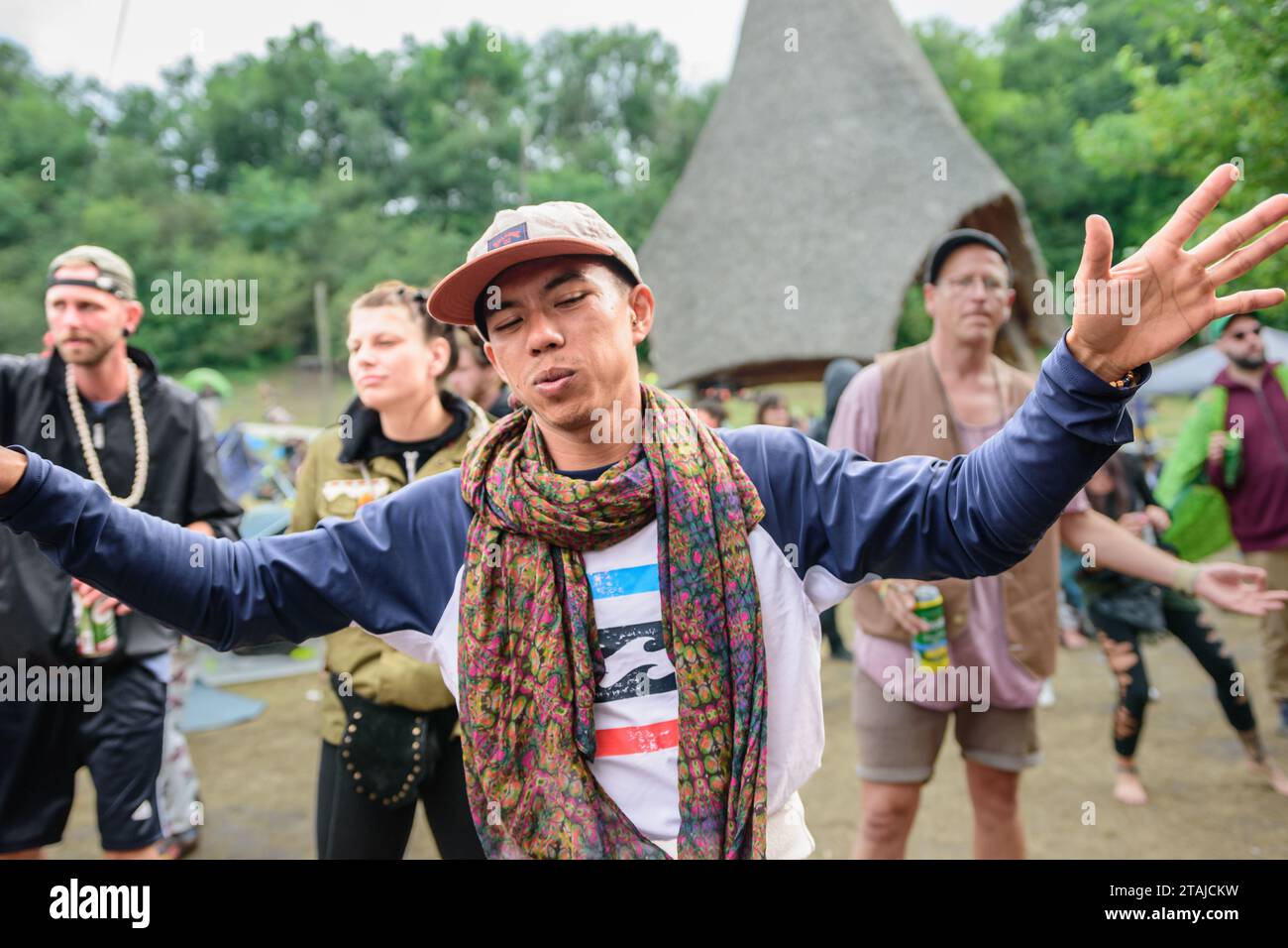 The people during the annual Ozora Festival near the Hungarian village ...