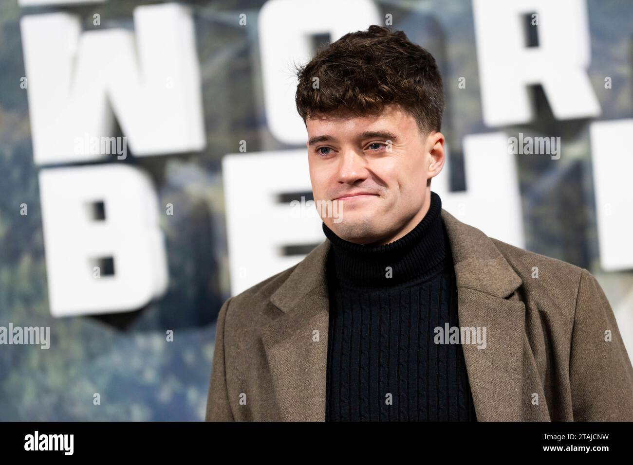 Sam Lewis poses for photographers upon arrival at the screening of the ...
