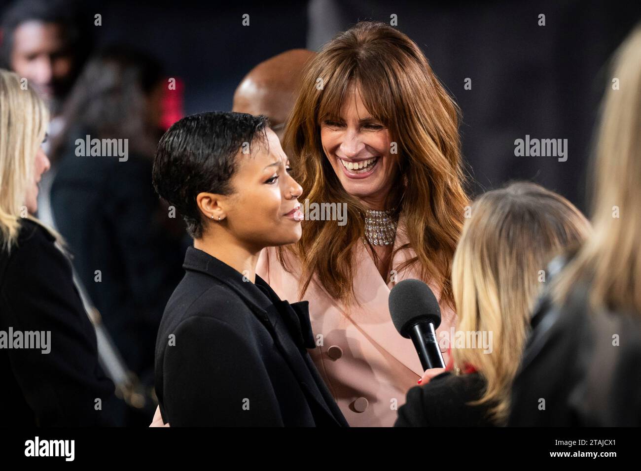 Myha'la Herrold, left, and Julia Roberts are interviewed upon arrival ...