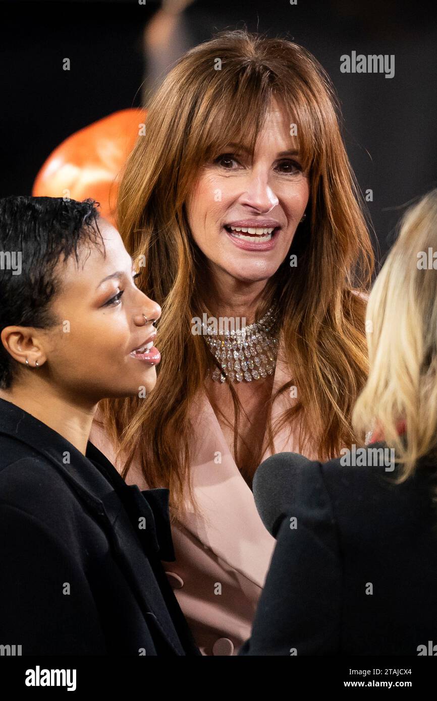 Myha'la Herrold, left, and Julia Roberts are interviewed upon arrival ...