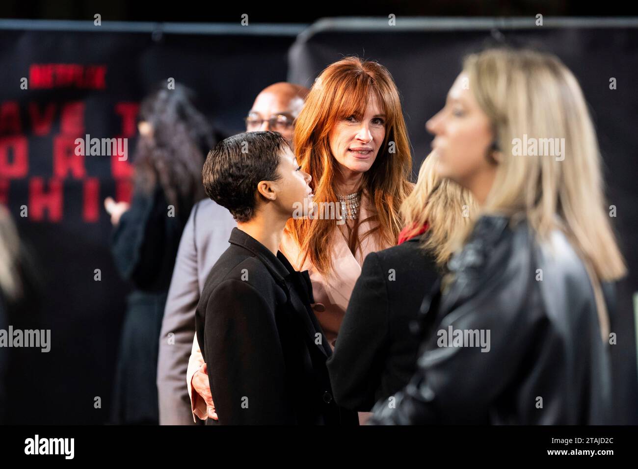 Myha'la Herrold, left, and Julia Roberts are interviewed upon arrival ...