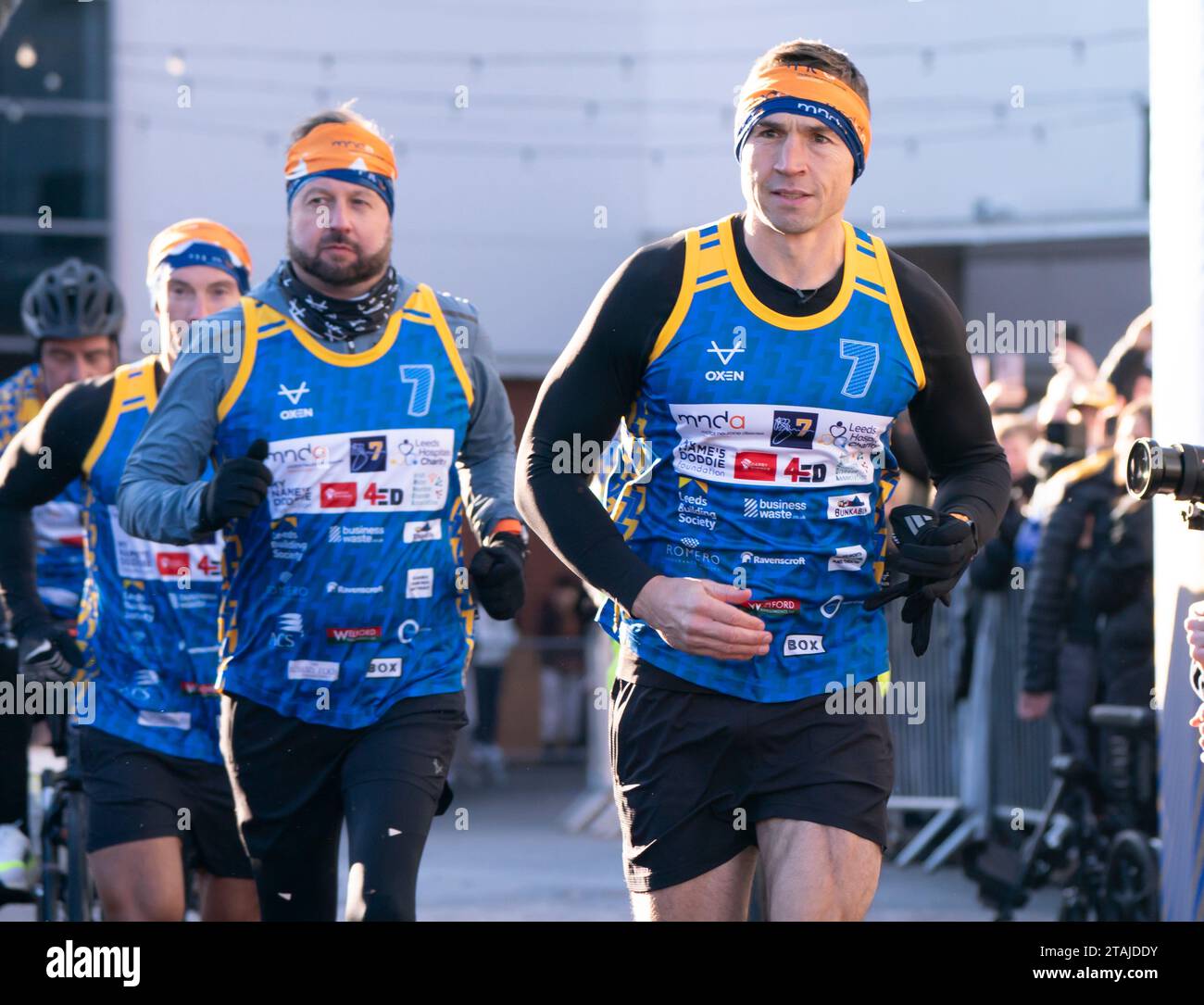 Kevin Sinfield (right) sets off at the start of day one of 7 in 7 in 7 ...