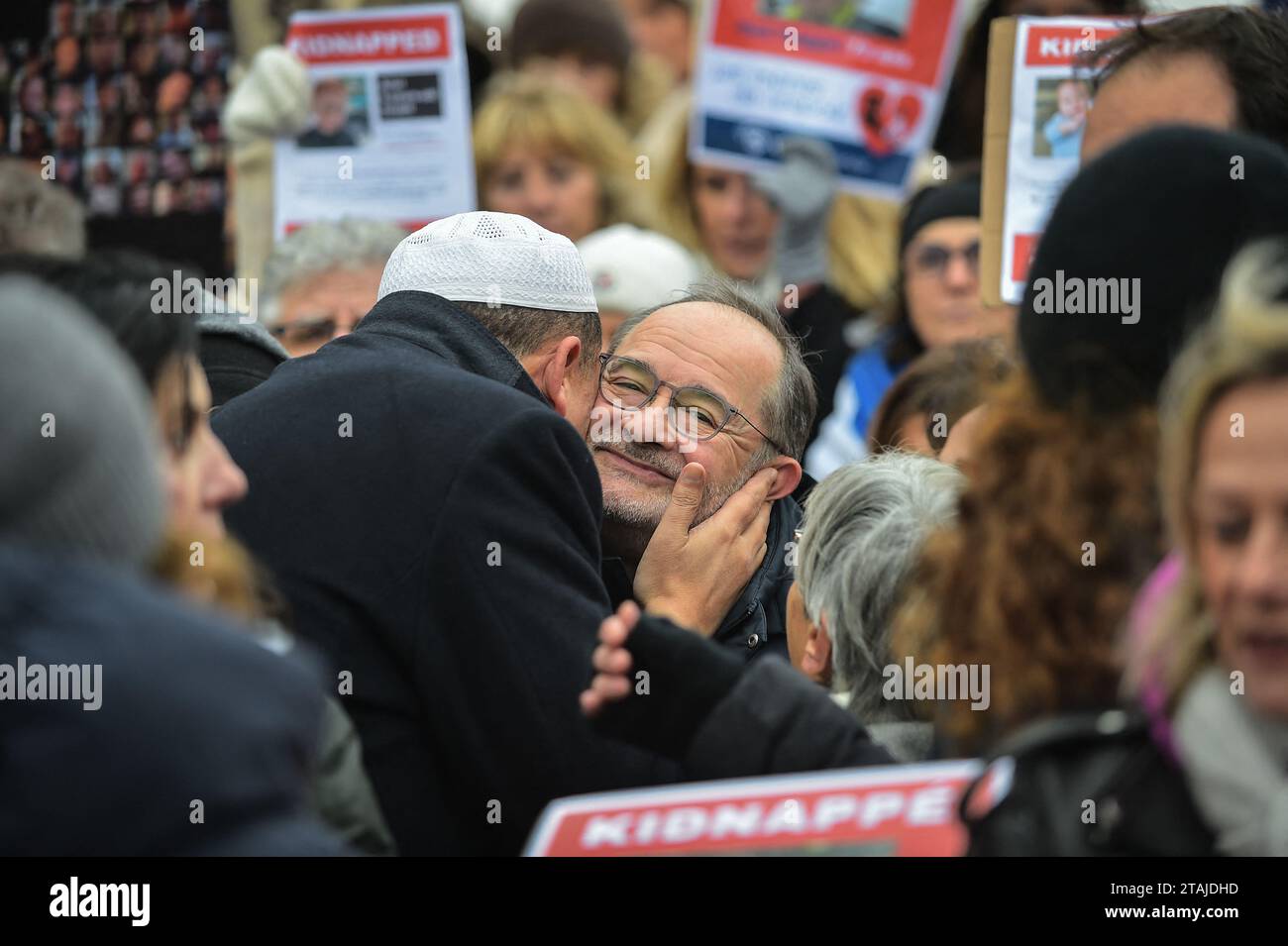 Paris, France. 01st Dec, 2023. Imam Hassen Chalghoumi (L) salutes ...