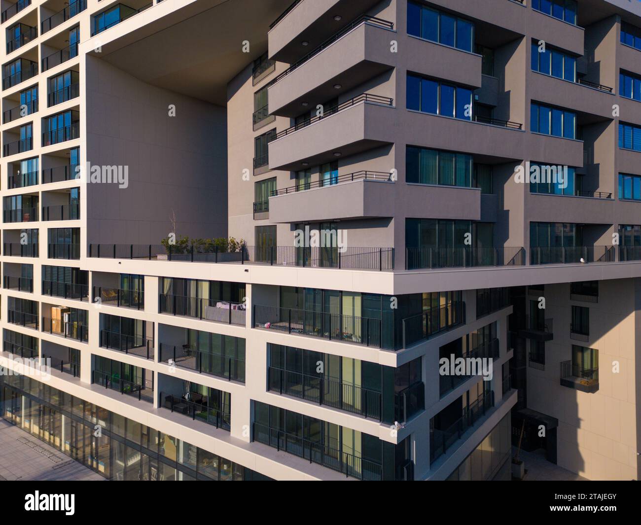 Drone flight along the facade of a modern office or residential ...
