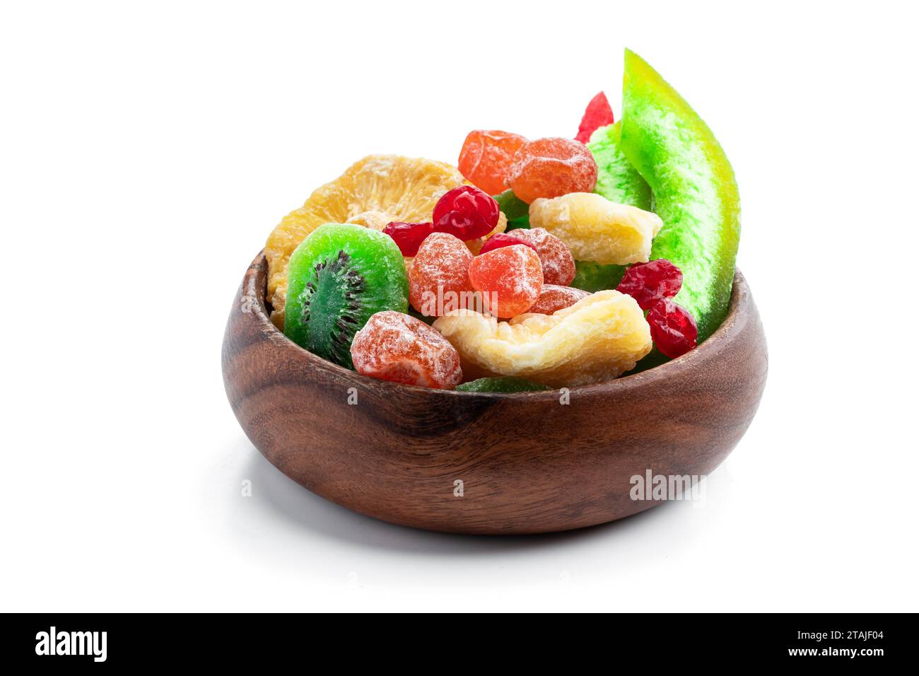 Candied fruits in wooden bowl isolated on white Stock Photo - Alamy