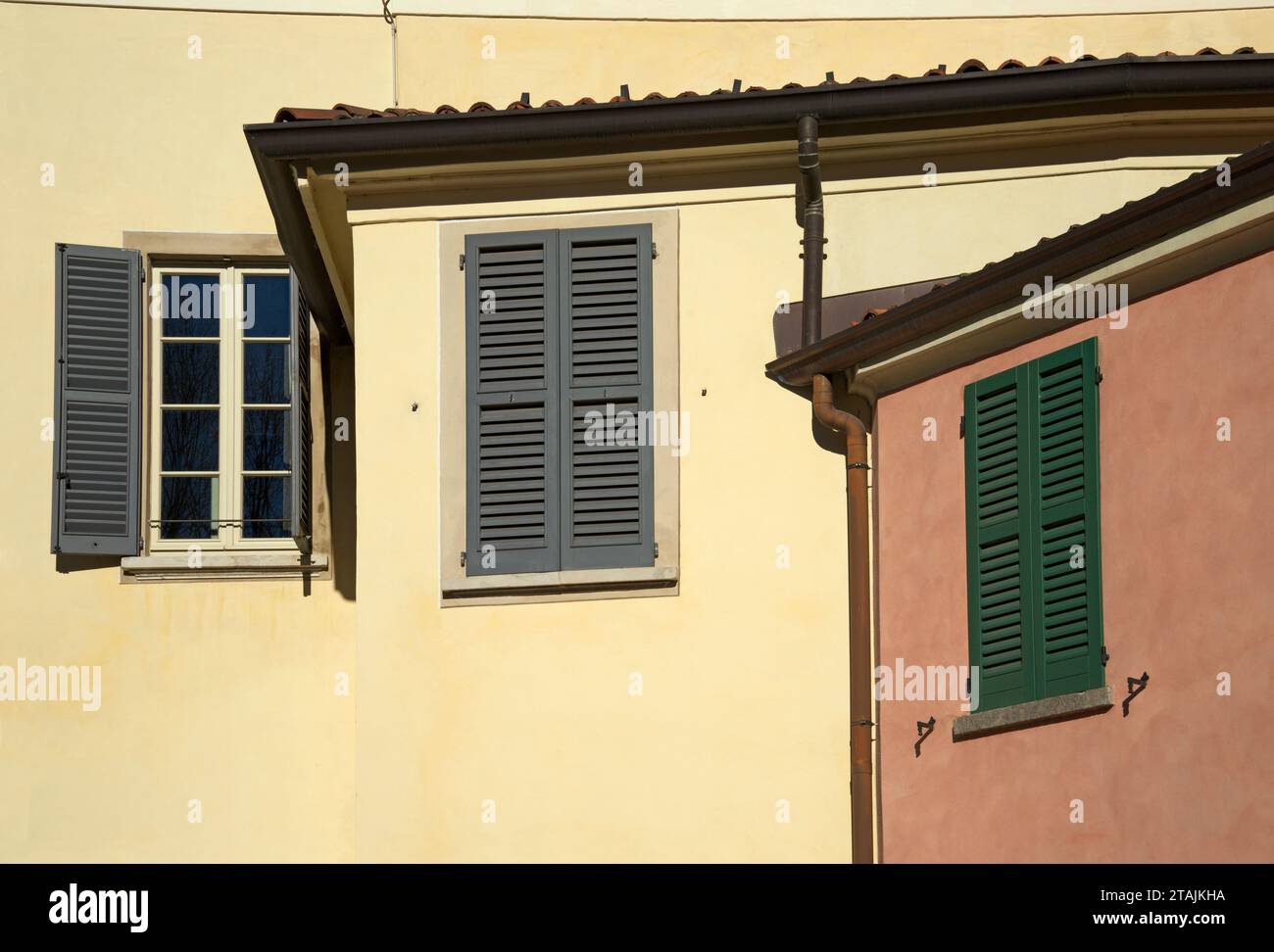 residential building windows with wooden shutters Stock Photo - Alamy