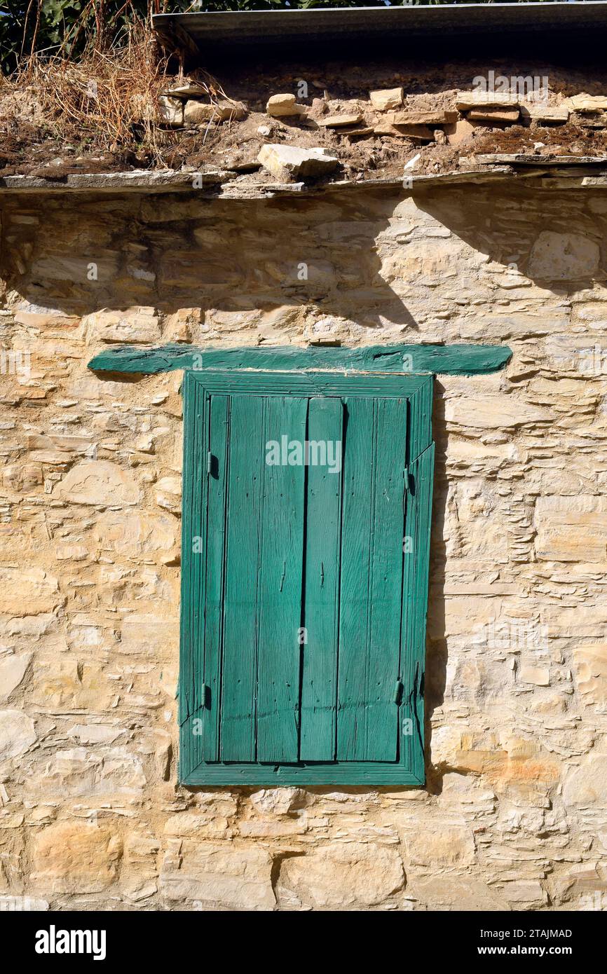 Cyprus - House of traditional construction with stones and green ...
