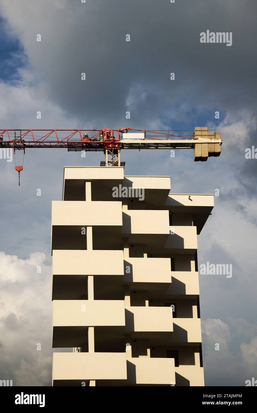 new apartment building and crane Stock Photo - Alamy