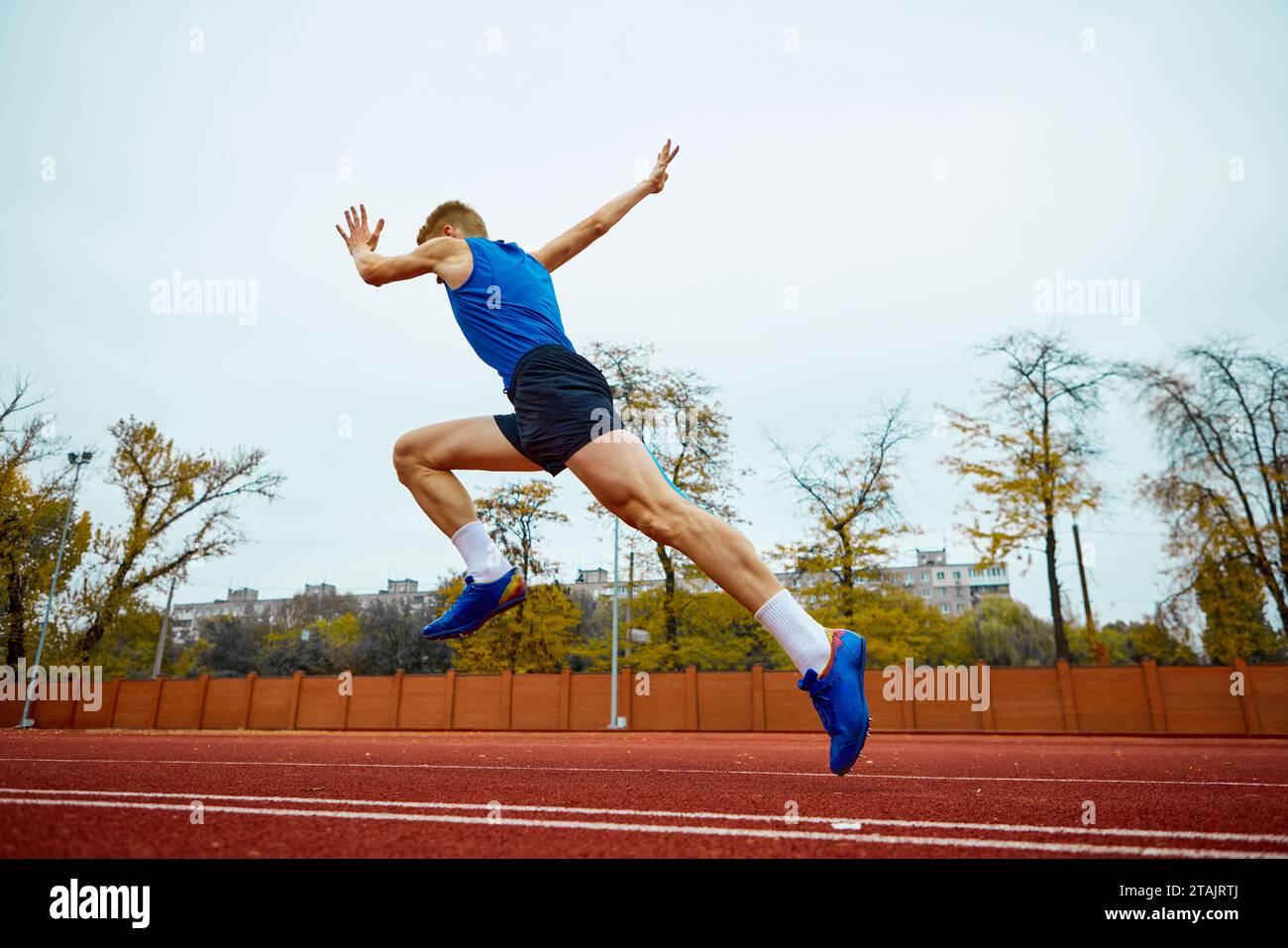 Dynamic steps leading to an impactful long jump. Bottom view full ...