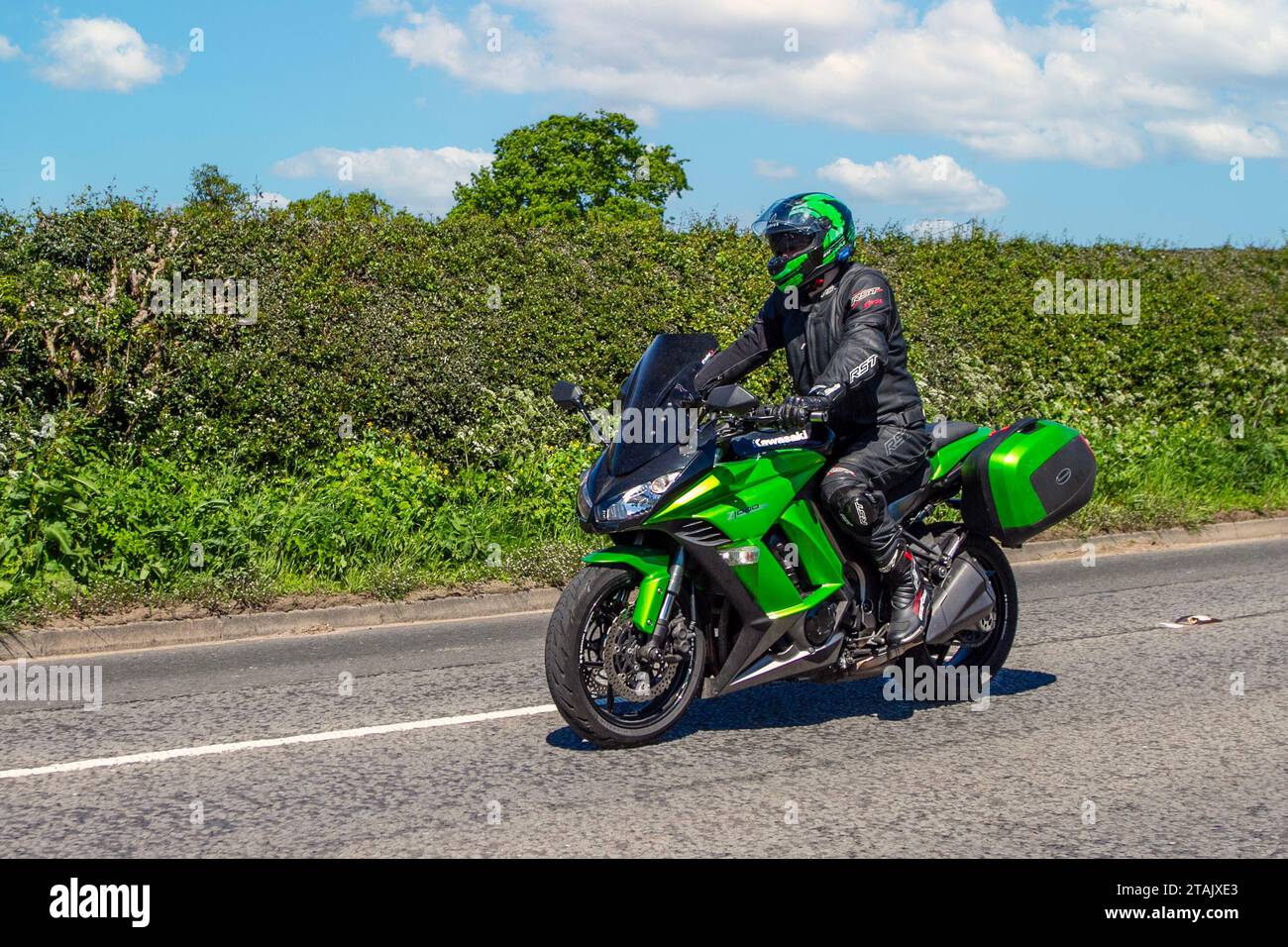 Male motorcyclist riding kawasaki hi-res stock photography and images ...