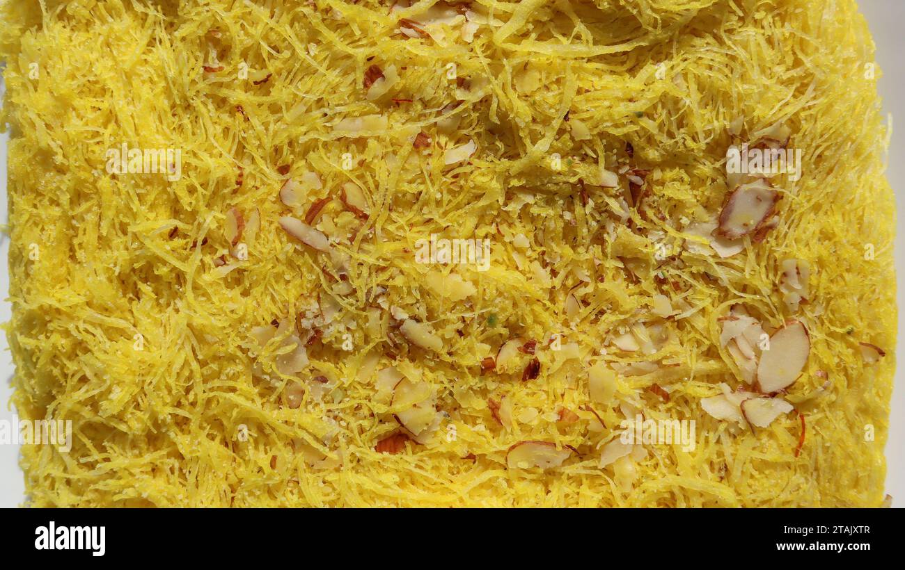 Traditional special Gujarati sweet Sutarfeni made with shredded ...