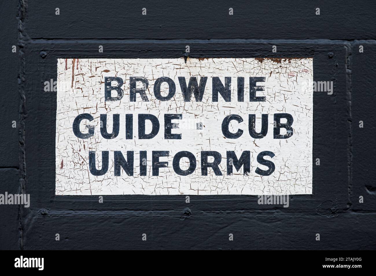An old sign advertising Brownie, Guide and Cub Uniforms, Glasgow ...