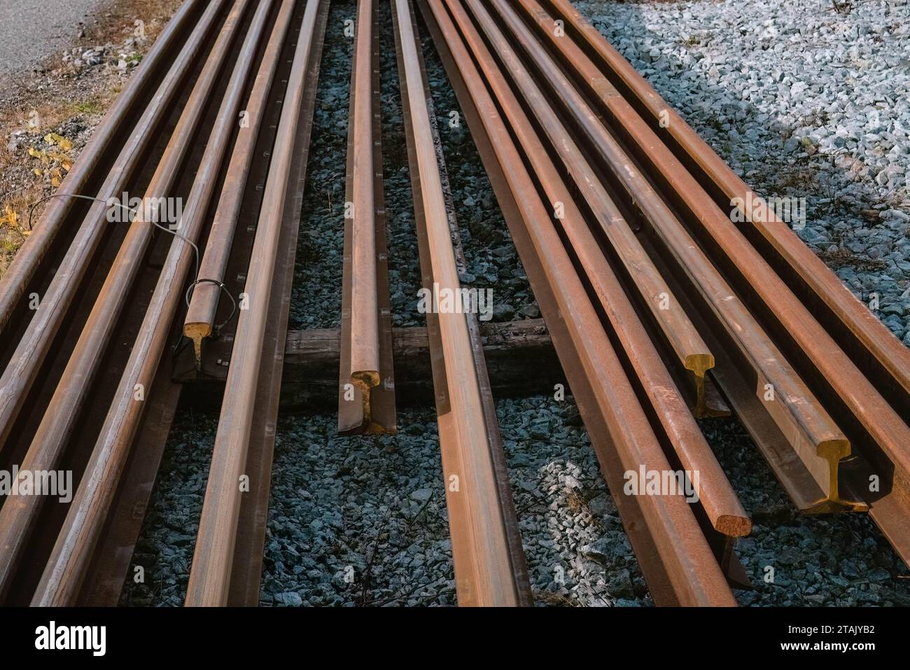Many new rails of different length stored at a ground for old rails ...
