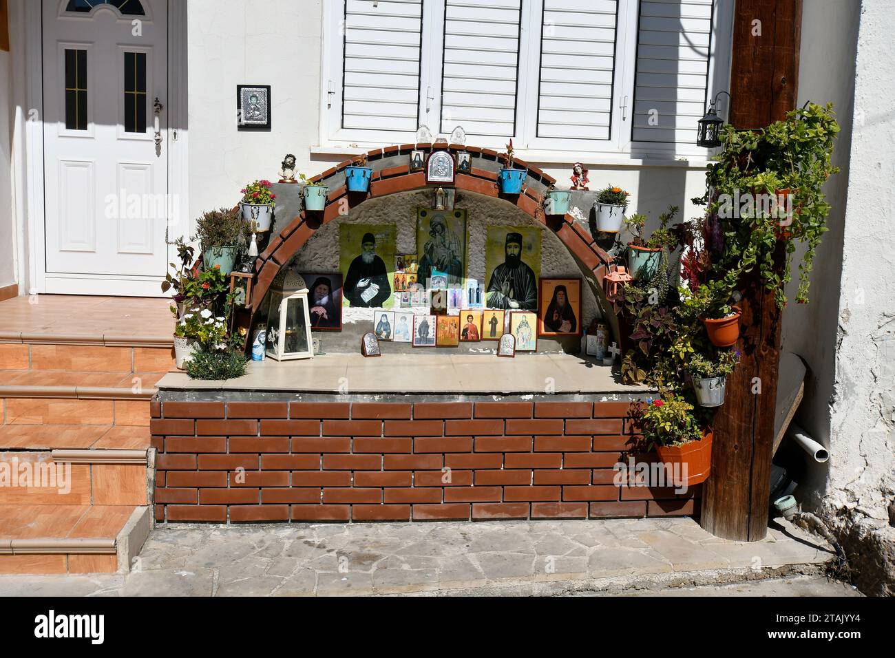 Cyprus, small religious private memorial on the front of the house in ...