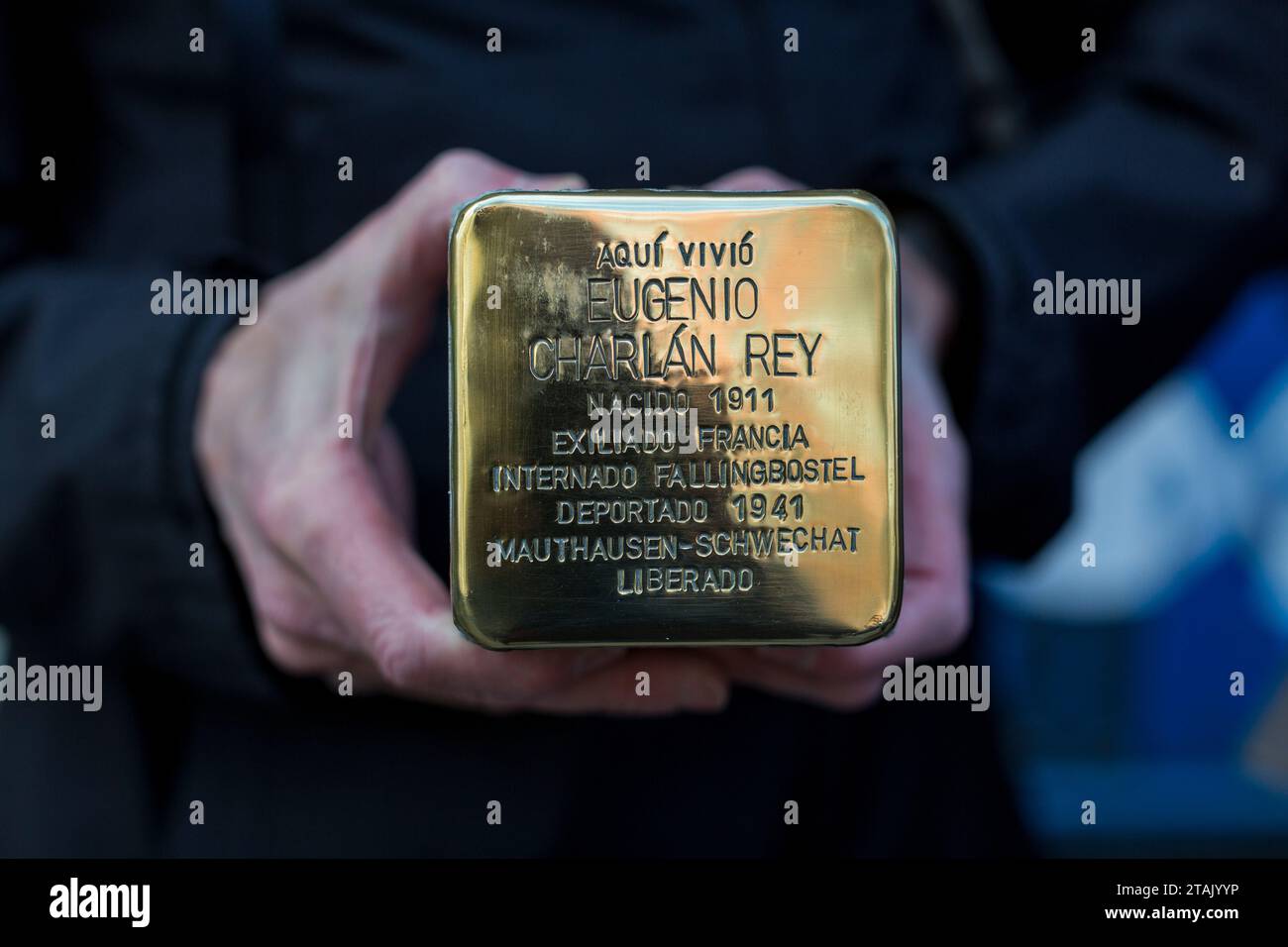 Madrid, Madrid, Spain. 1st Dec, 2023. A man holds the Stolpersteine to ...