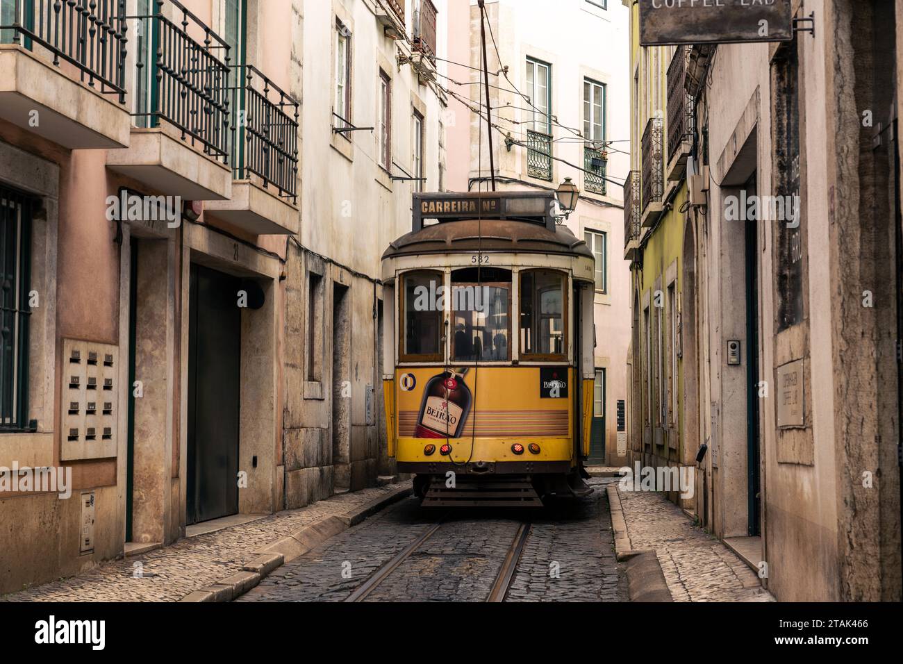 The iconic yellow tram of Lisbon, tram 28 Stock Photo - Alamy