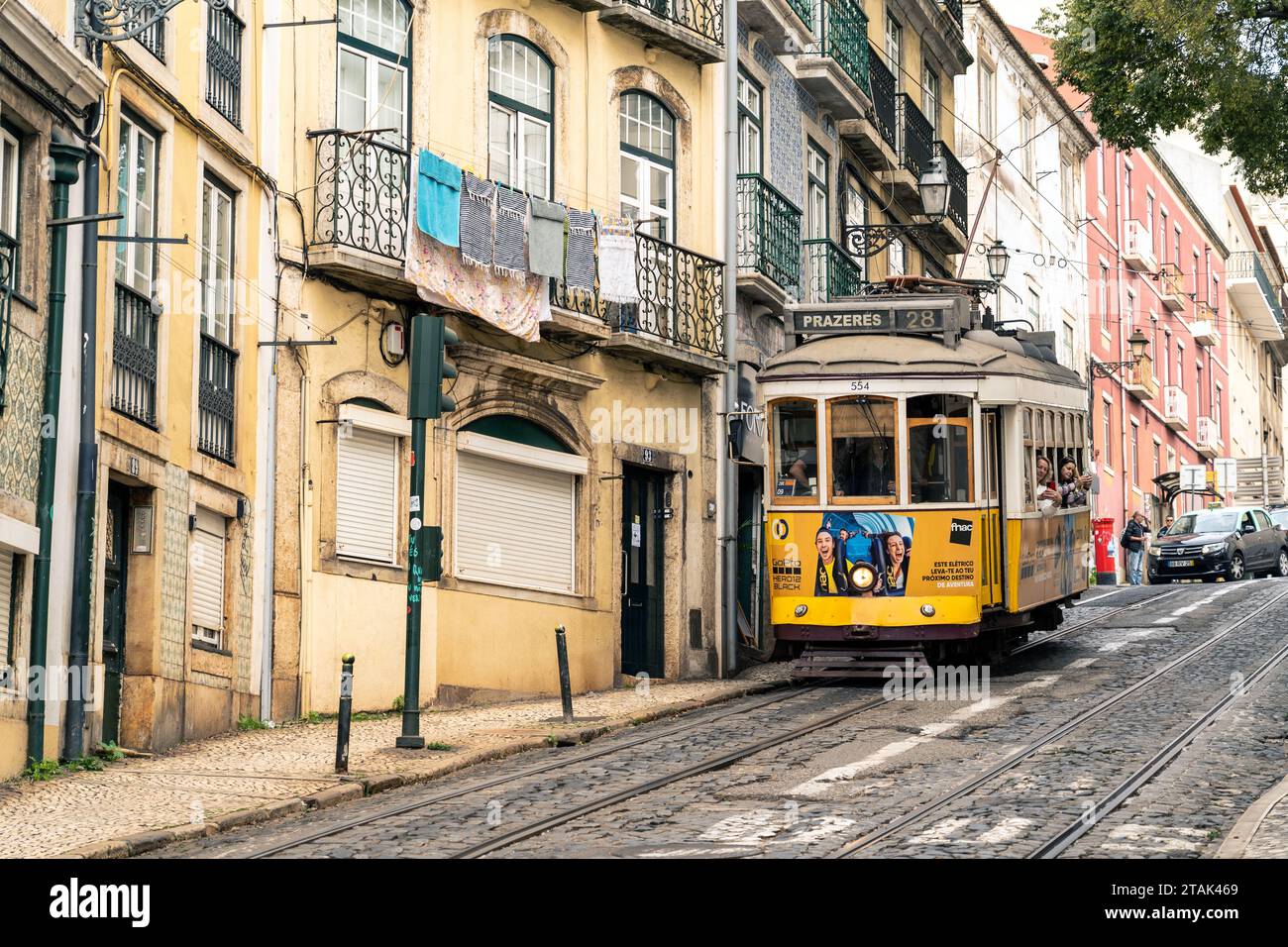The iconic yellow tram of Lisbon, tram 28 Stock Photo - Alamy