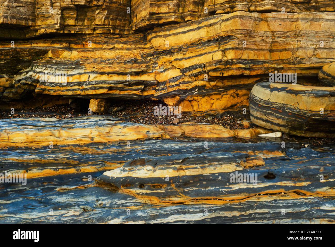 Colorful abstract of rock formation on Pacific ocean coastline, Worn ...