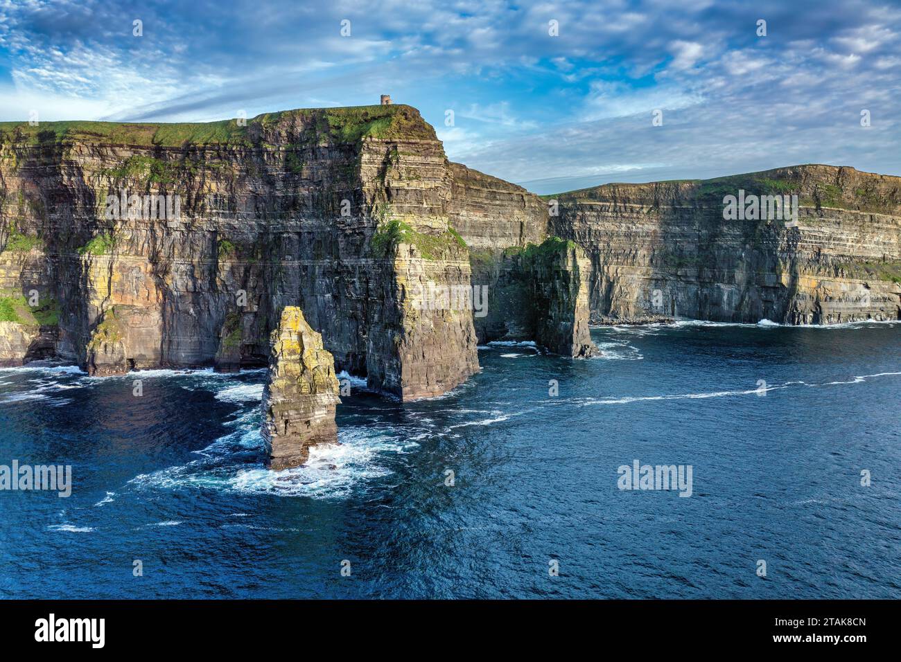 Aerial view of the Cliffs of Moher near sunset along the Burren region ...
