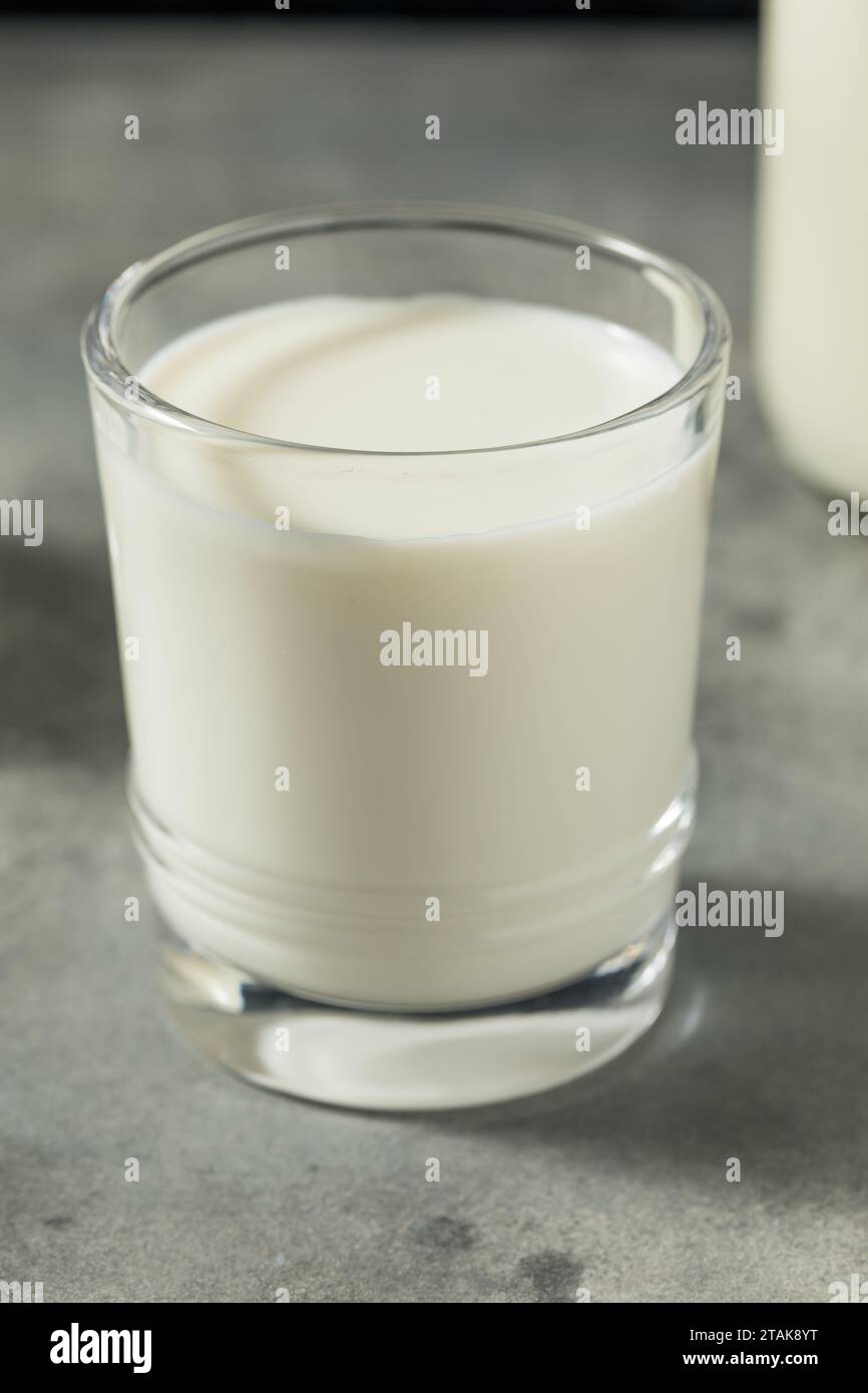 Organic Grass Fed Whole Cow Milk in a Glass Stock Photo - Alamy