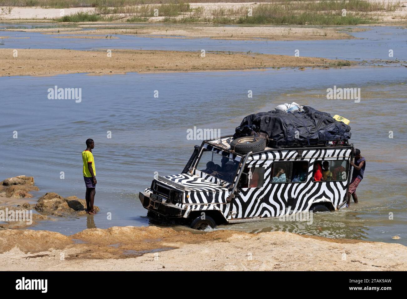 Off-road four-wheel drive bush taxi with local Malagasy passengers ...