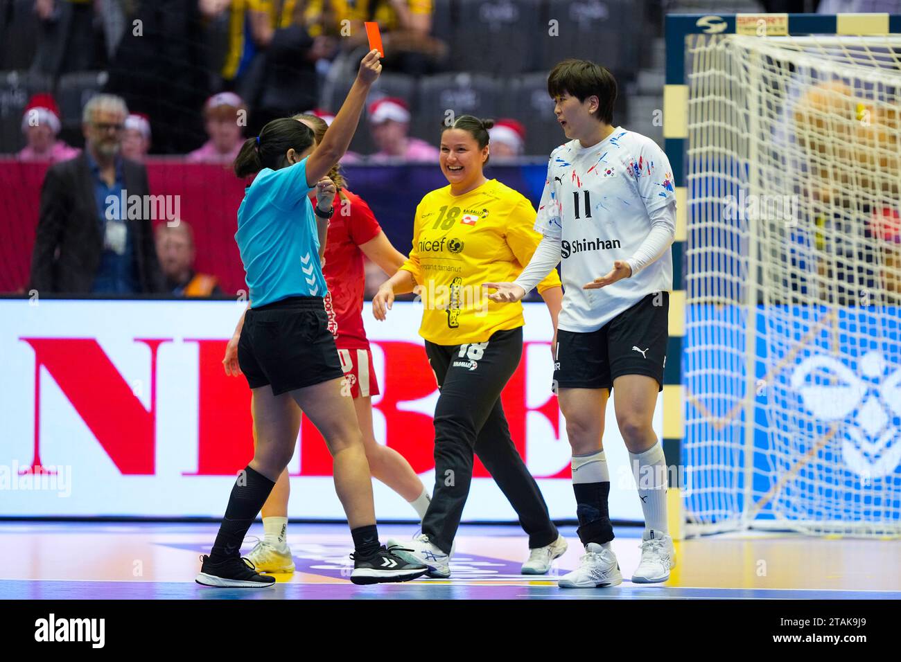 South Korea's Eun Hee Ryu, right, gets a red card for hitting Greenland ...