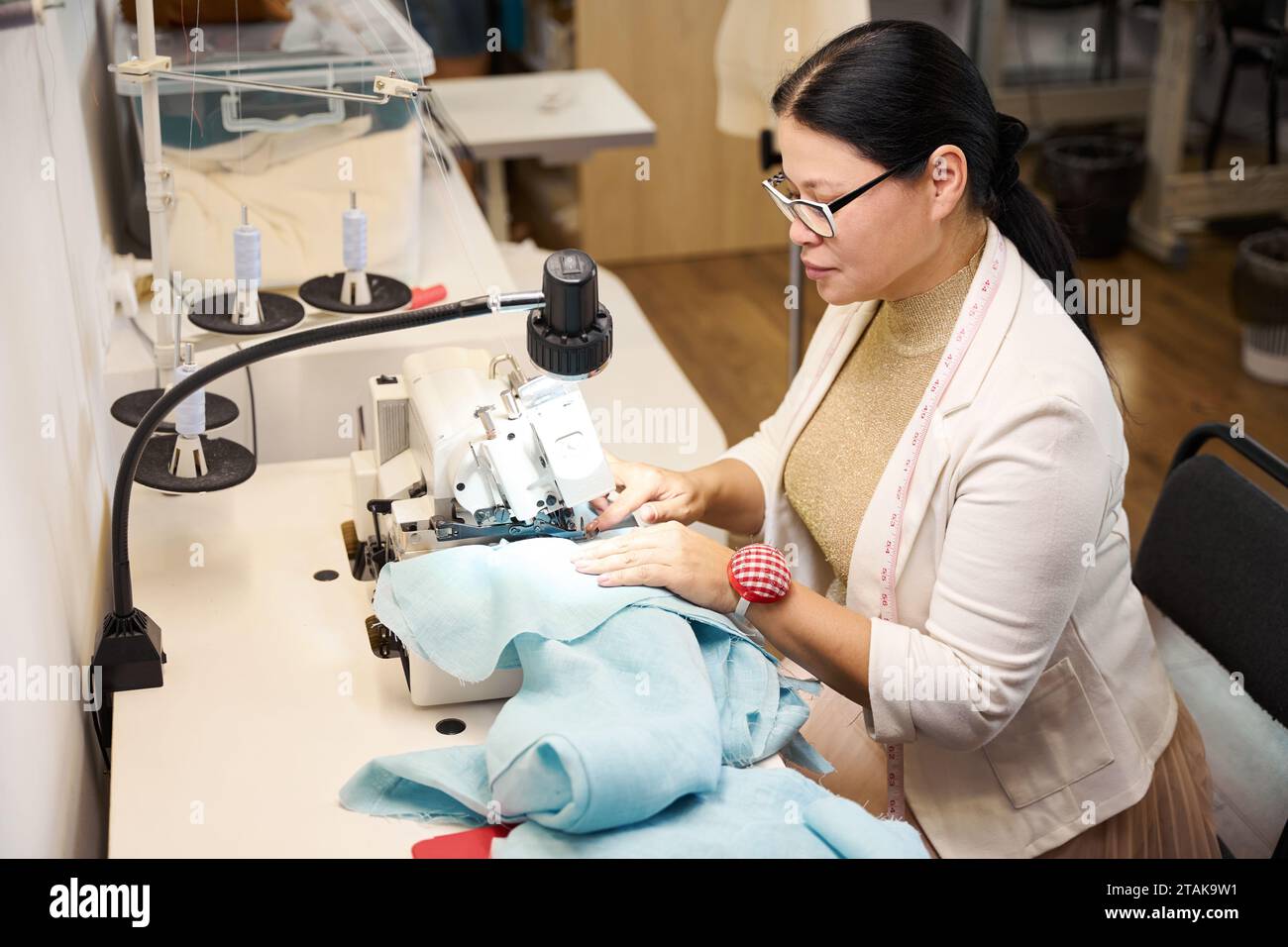 Fashion designer sews dress hi-res stock photography and images - Alamy