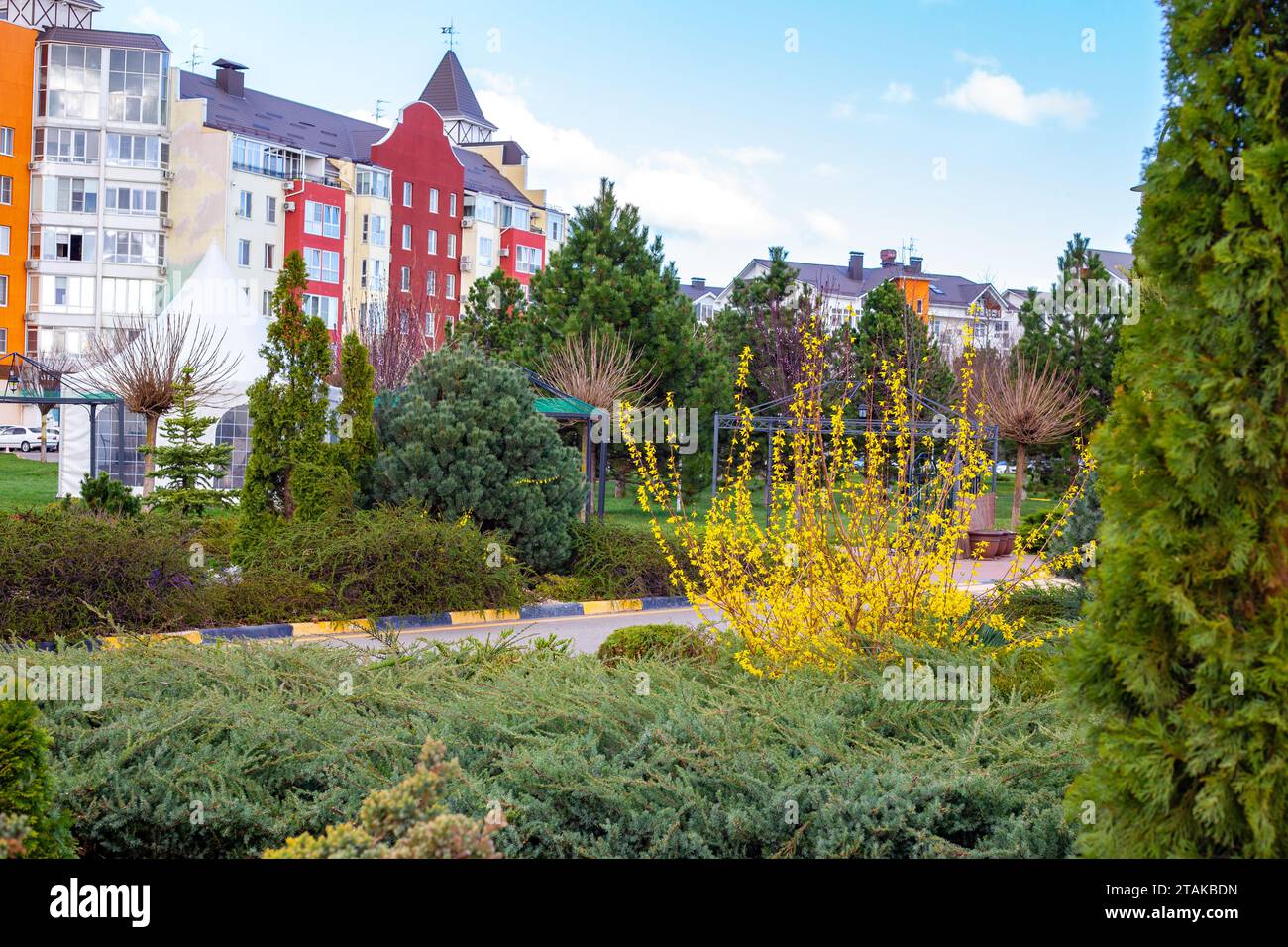 Cityscape. Beautiful colorful houses and lush green spaces within the ...