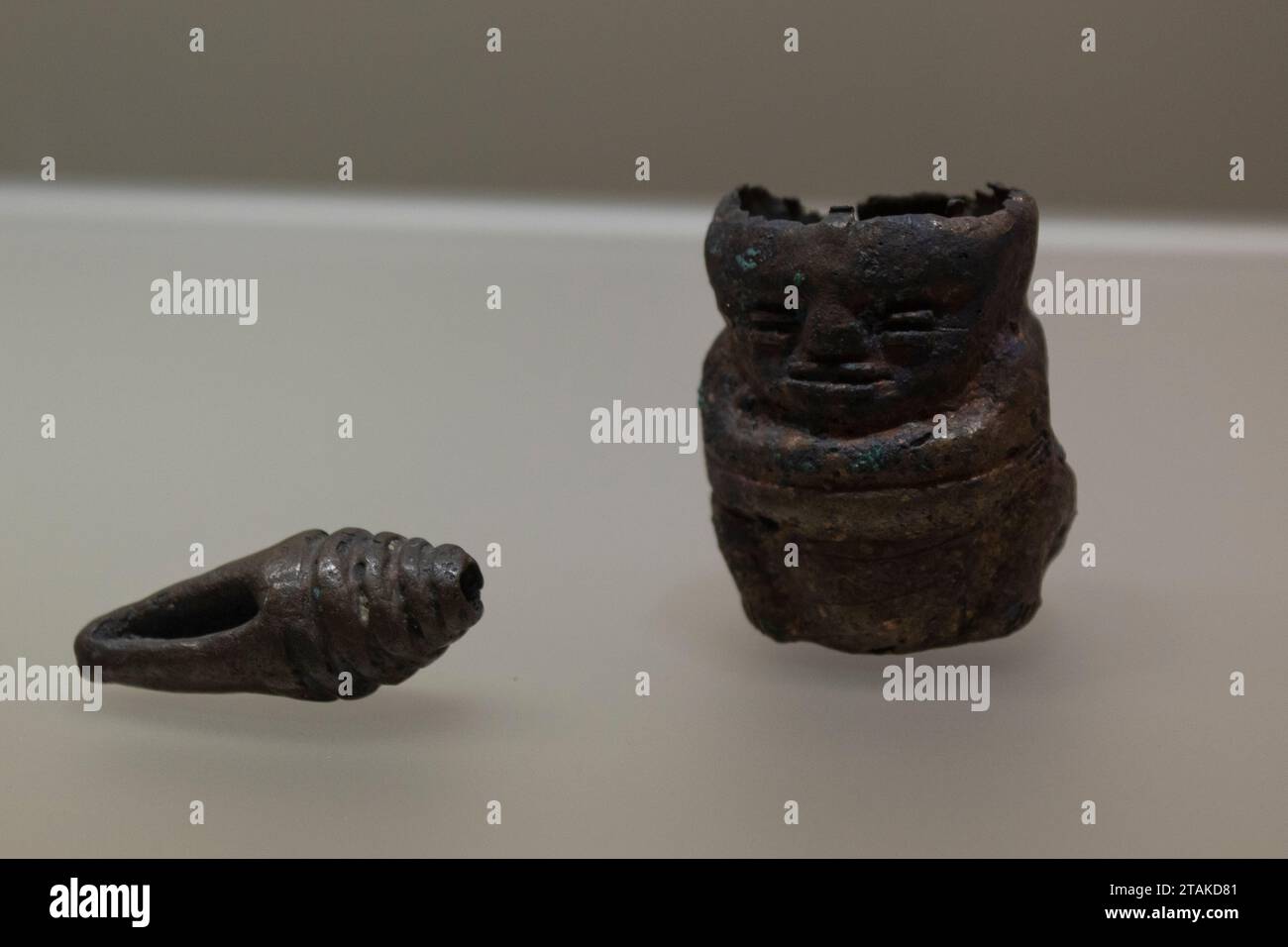 Closeup to an ancient indigenous small copper anthropomorphic figure ...