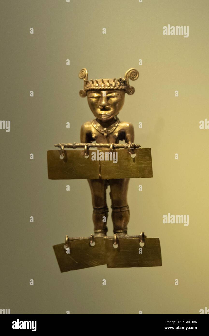 Beautiful indigenous golden figure at colombian golden museum Stock ...