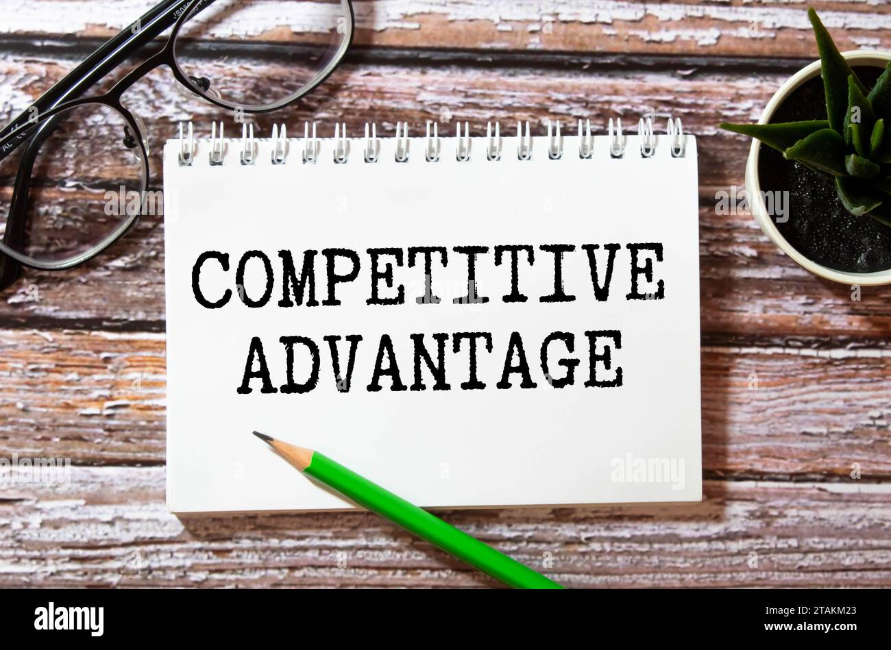 Business and finance concept. On a red background, there are wooden ...