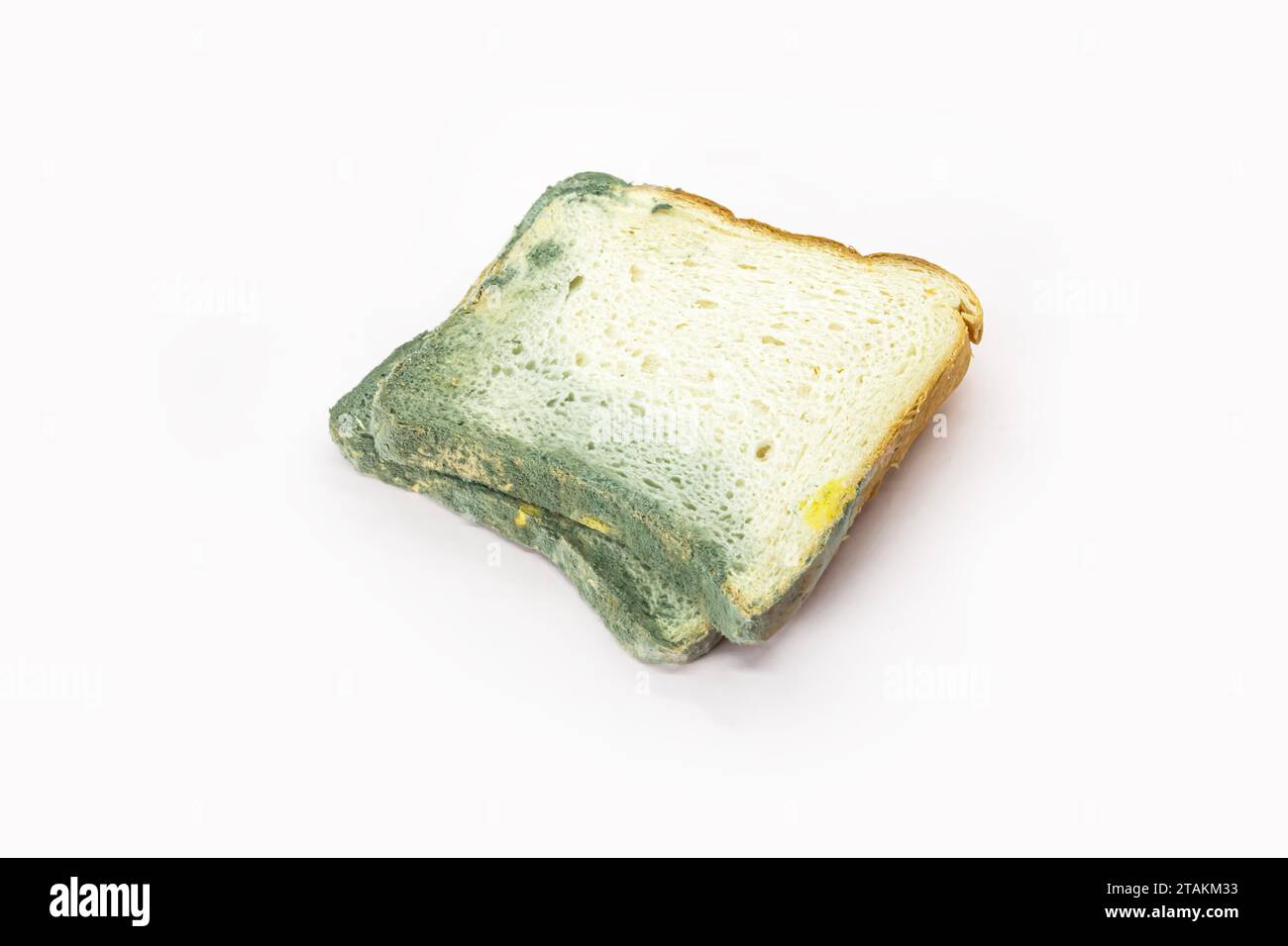 A piece of fungus bread Isolated on white background. Top view Stock ...