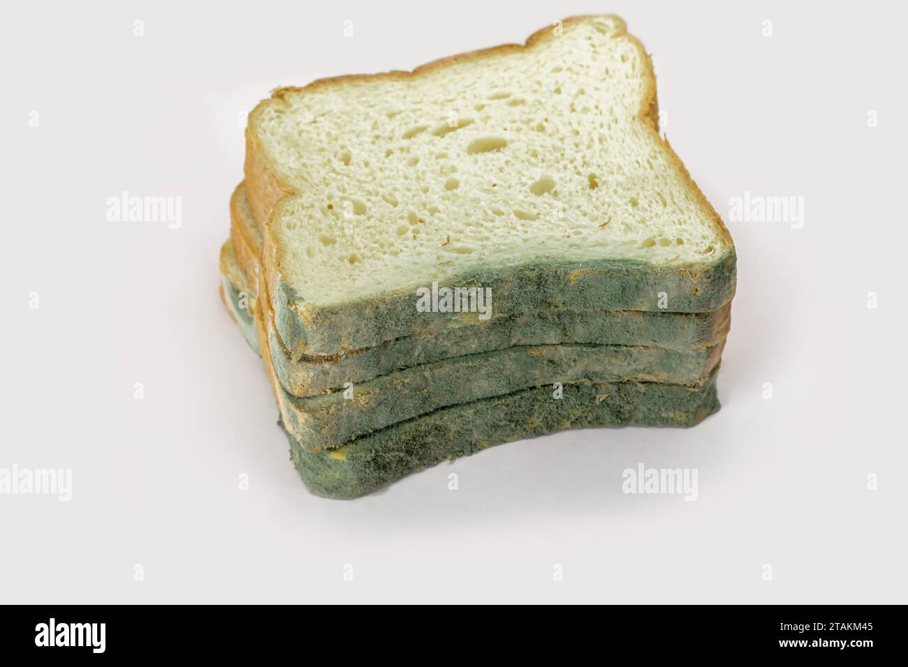 Wasted bread isolated on white background. Biodegradable food waste ...