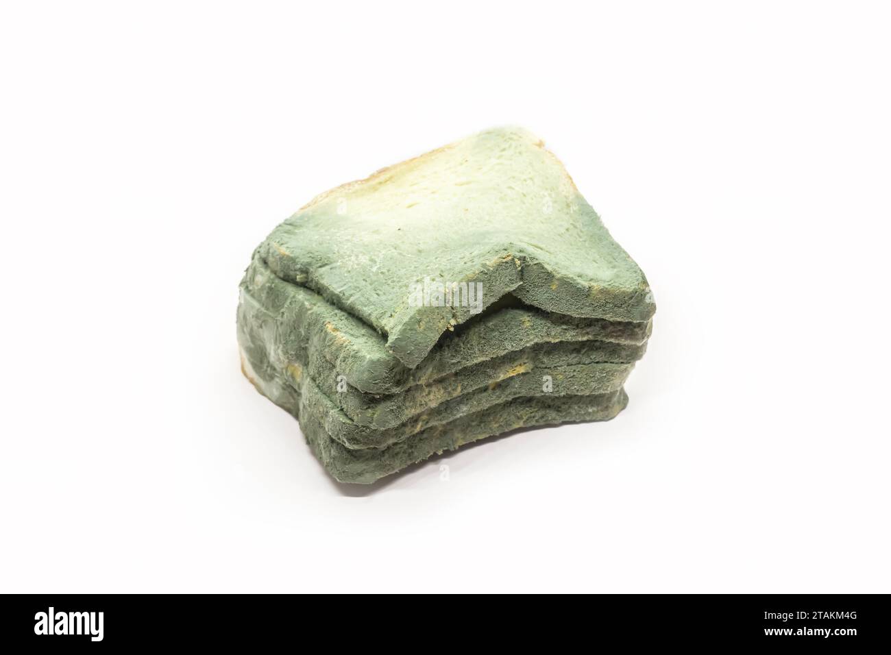 Wasted bread isolated on white. Biodegradable food waste concept Stock ...