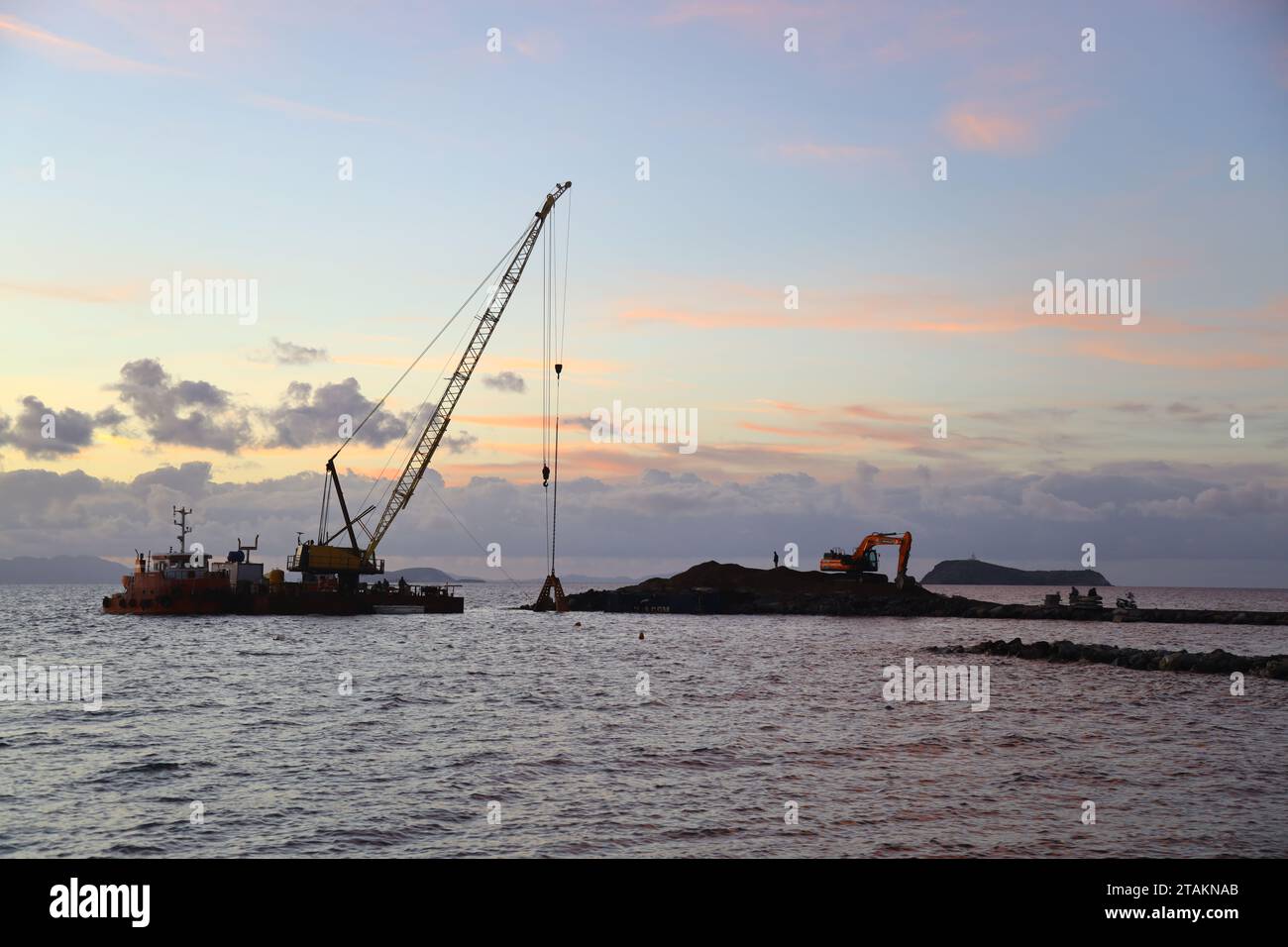 Bodrum, Mugla, Turkey. December 01, 2023: Silhouettes of giant cranes ...