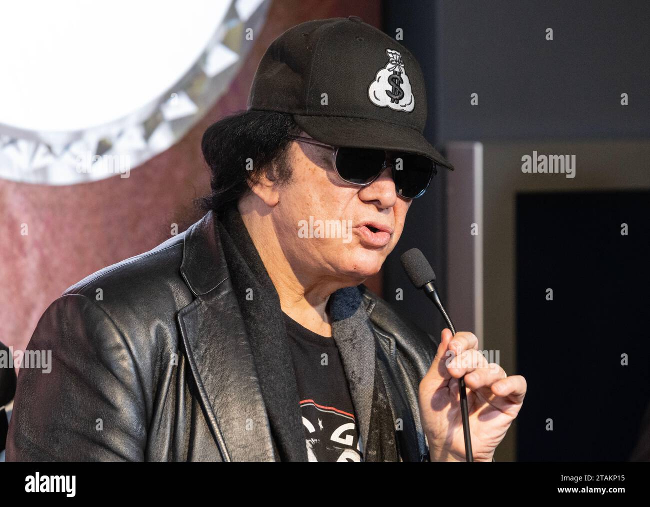 Gene Simmons of KISS band speaks during ceremonial lighting of the ...