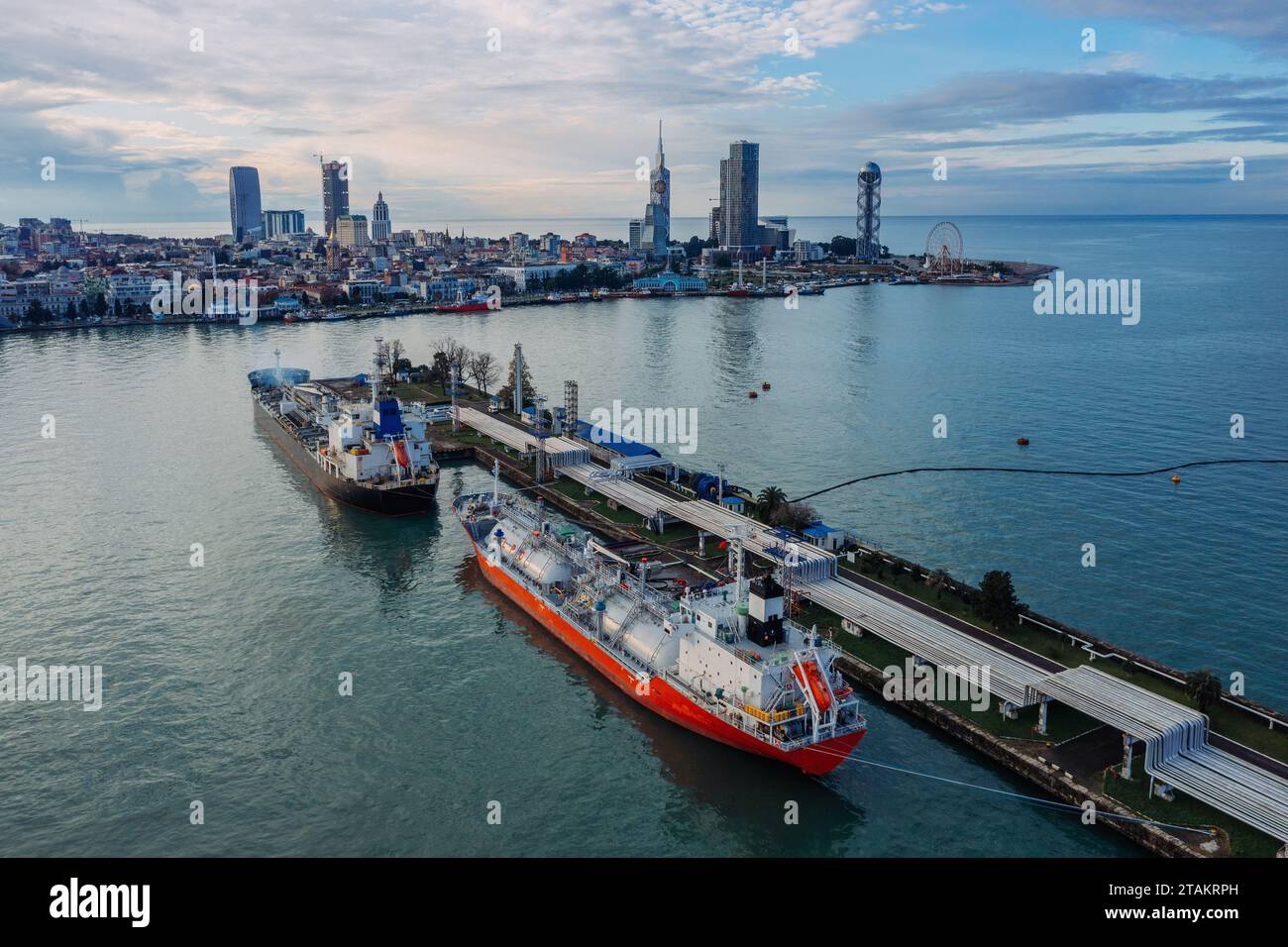 Ship tankers with LPG, oil or chemical production. Process of loading ...