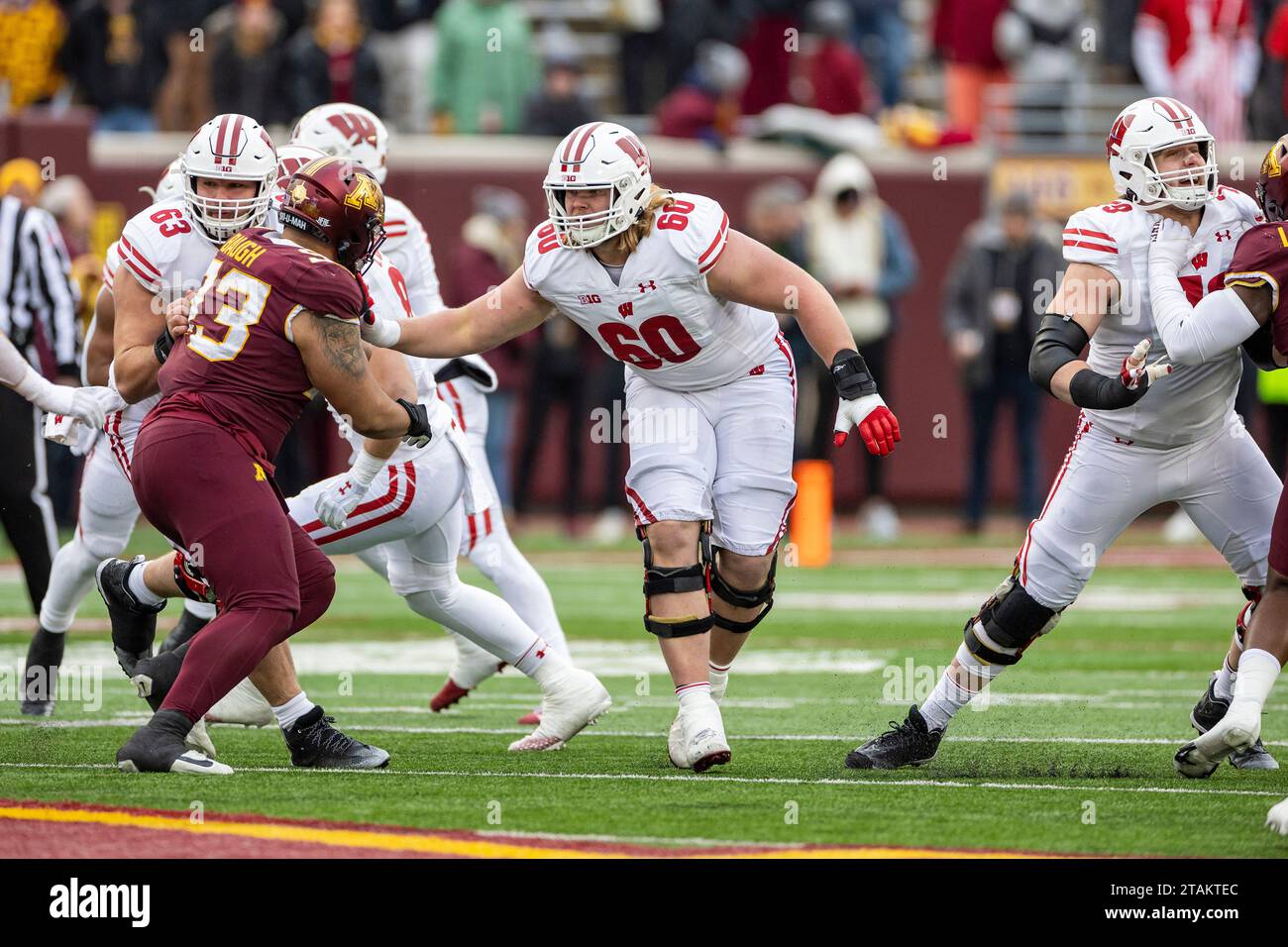 Wisconsin Badgers offensive lineman Joe Huber (60) blocks during a Big ...