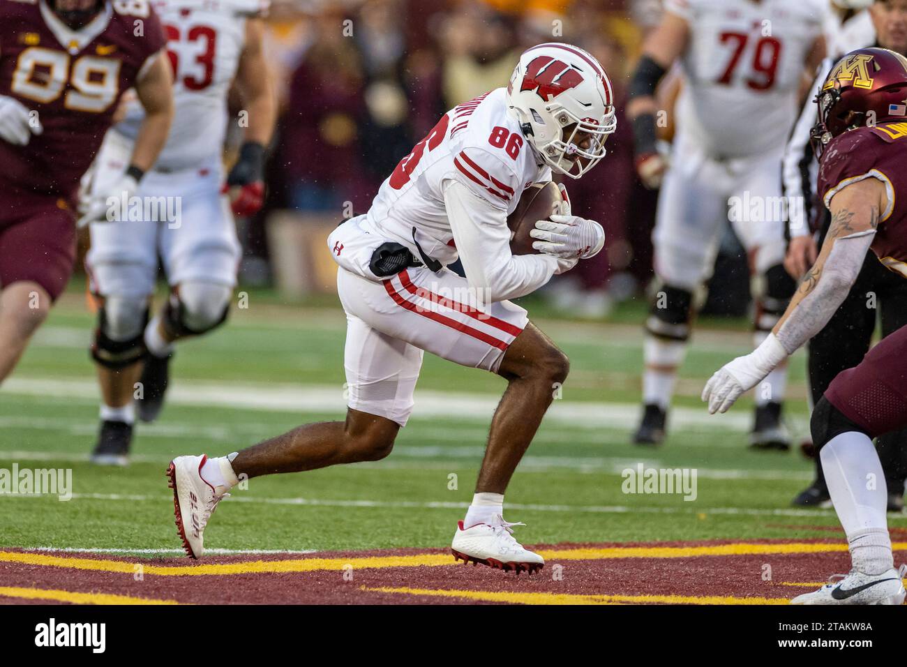 Wisconsin Badgers wide receiver Vinny Anthony II (86) carries the ball ...