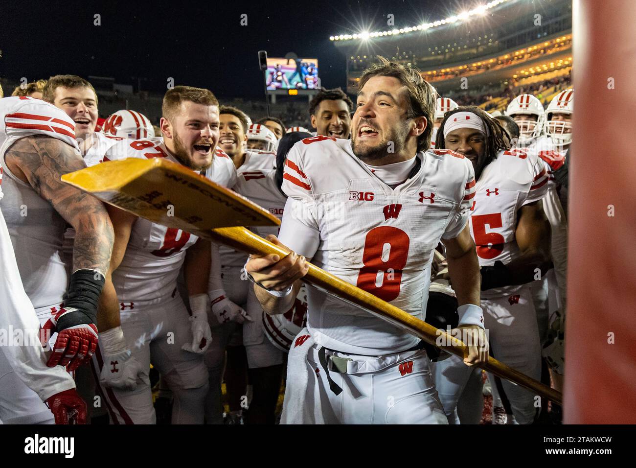 Wisconsin Badgers celebrate with the Paul Bunyan Axe after a Big Ten ...