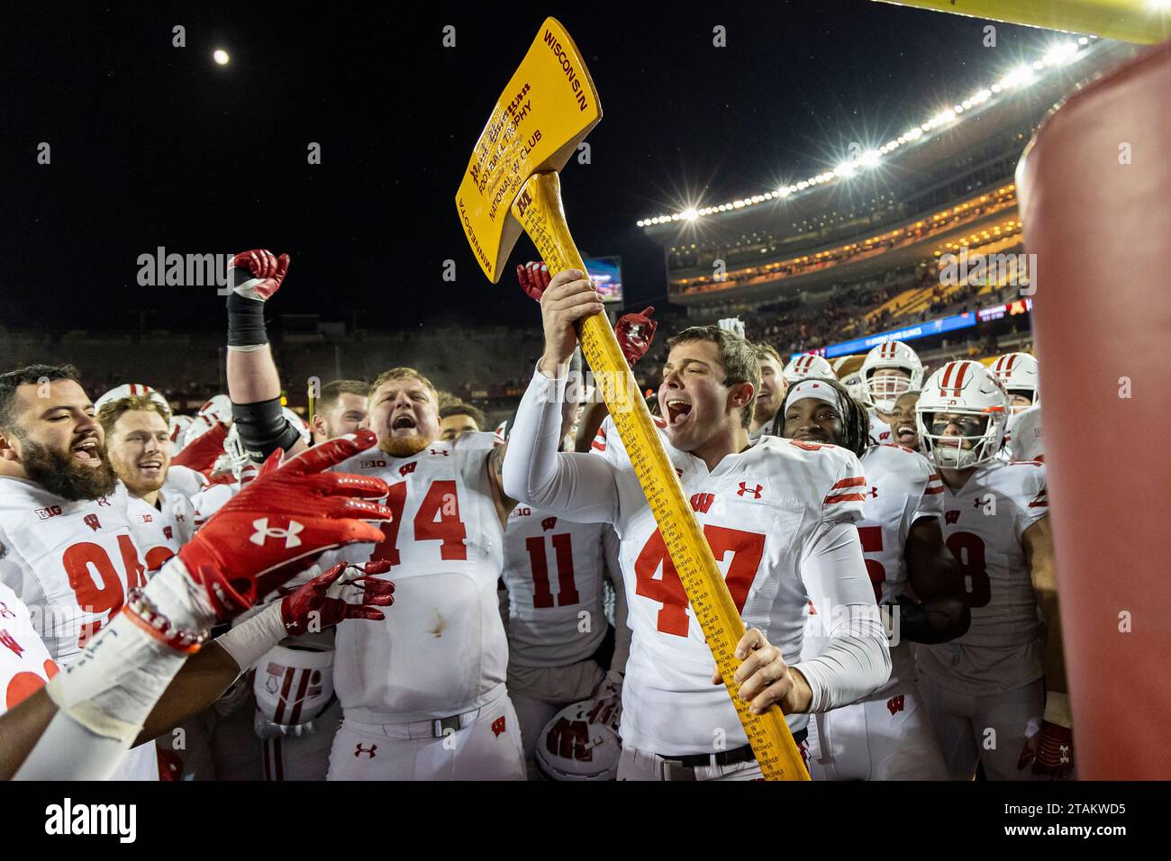 Wisconsin Badgers celebrate with the Paul Bunyan Axe after a Big Ten ...