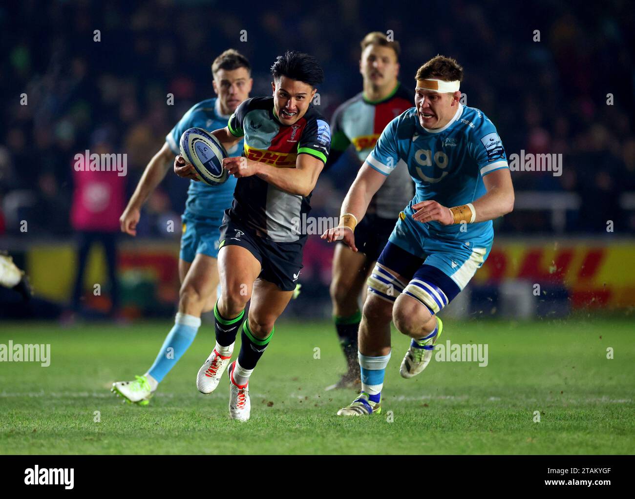 Harlequins' Marcus Smith runs clear of Sale Sharks' Cobus Wiese during ...