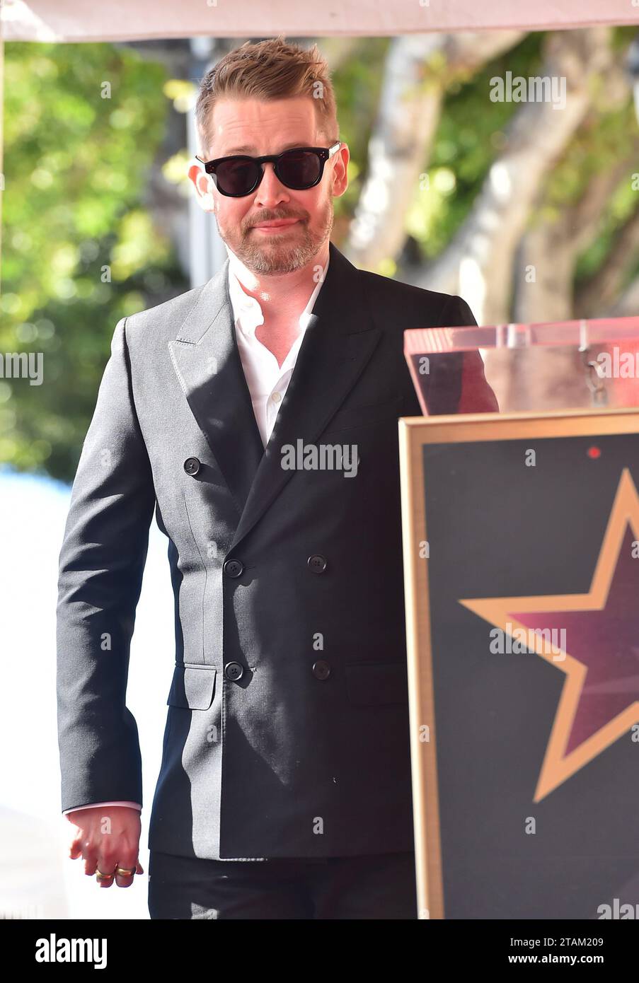 Macaulay Culkin attends a ceremony honoring him with a star on the ...