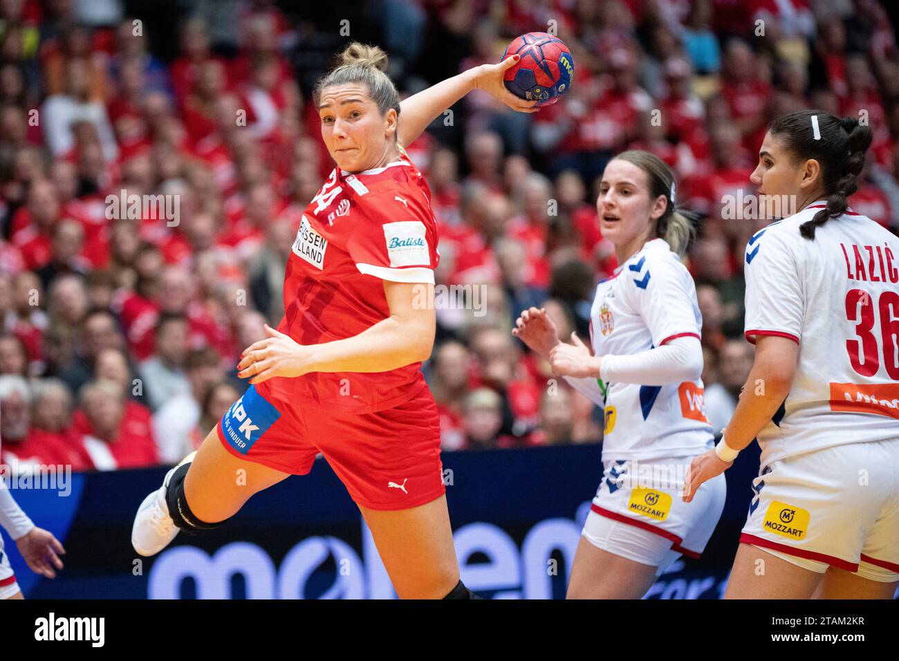 Denmark's Rikke Iversen fights past Serbia's Emilija Lazic and Jovana Jovovic during the World ...
