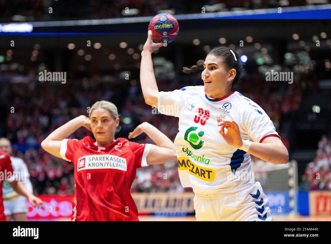 Serbia's Emilija Lazic slips past Denmark's Sarah Iversen during the ...