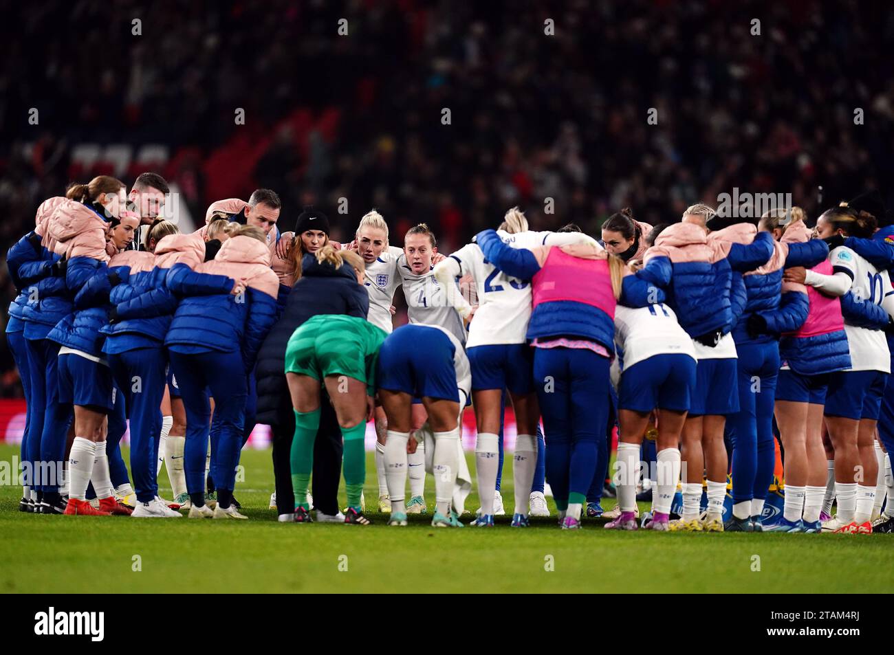 England have a team huddle after the final whistle of the UEFA Women's ...